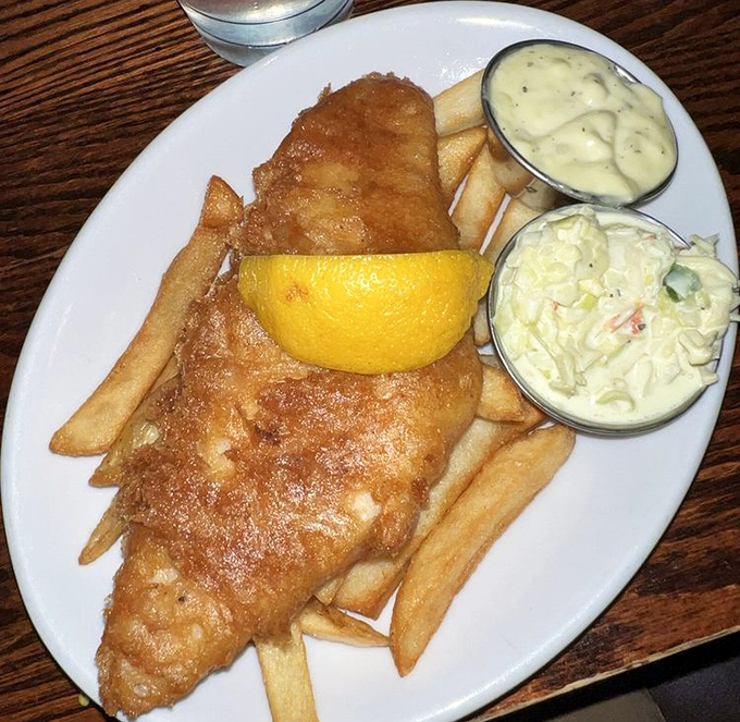 Golden-battered cod that shatters with each bite, paired with proper chips and house-made tartar sauce. This is fish that would make Neptune jealous. 