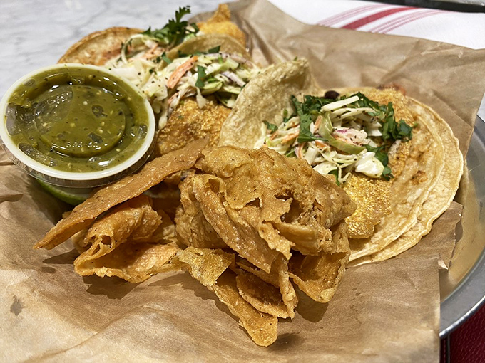 These fish tacos aren't just food &ndash; they're edible postcards from coastal vacations you wish you were still on.