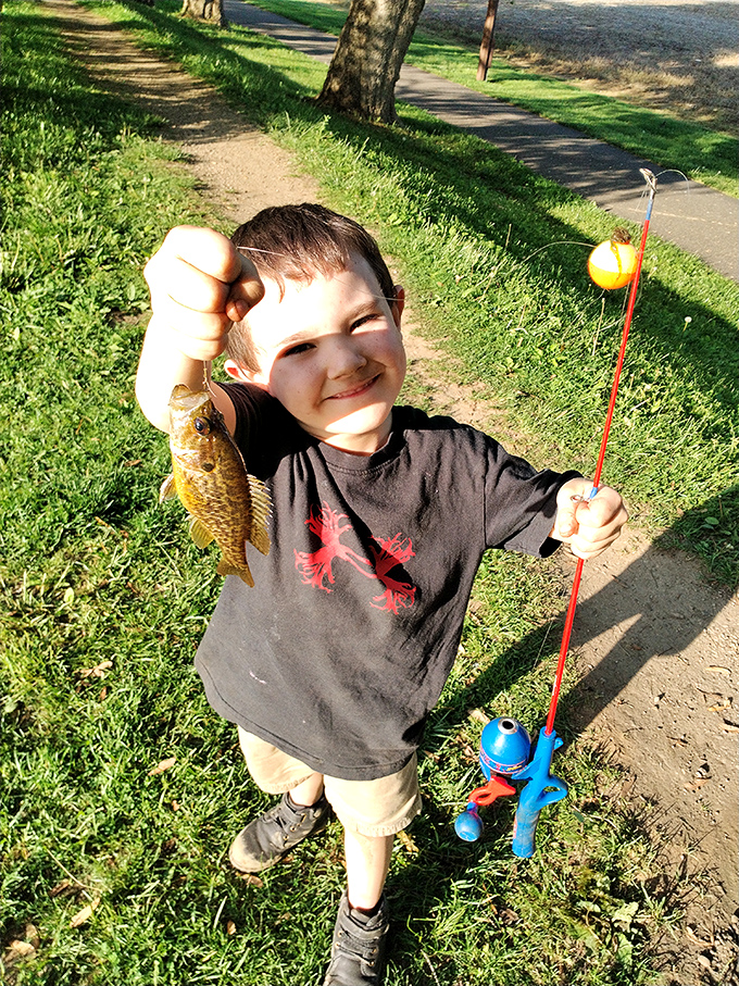 Young anglers discover that patience tastes better when it comes with a side of sunshine.