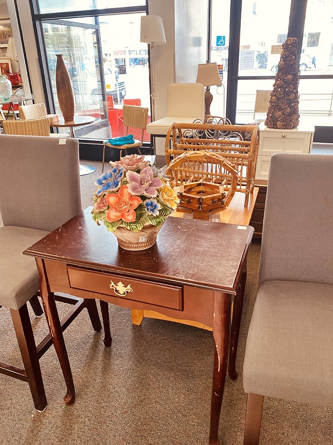 Vintage side tables and decorative florals create instant character. This isn't just furniture—it's conversation pieces with stories already built in.