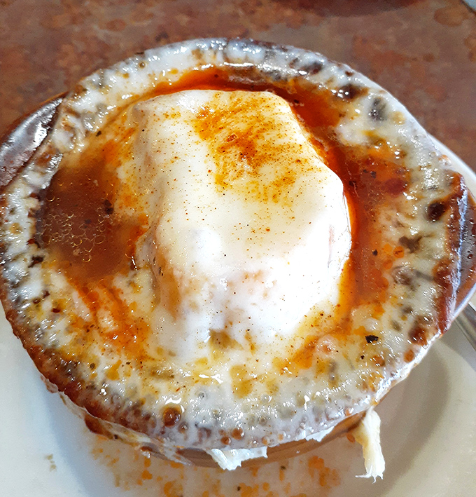 French onion soup so good it makes you wonder why we don't start every meal with melted cheese.