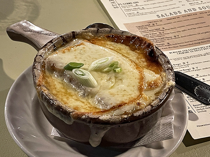 This French onion soup isn't playing around. Bubbling cheese cascades down the sides like a delicious waterfall you'll want to dive into headfirst.
