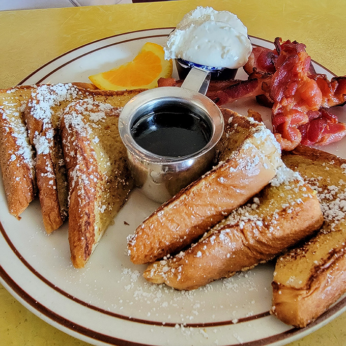Behold the French toast that launched a thousand return visits &ndash; dusted with powdered sugar like sweet morning snow.