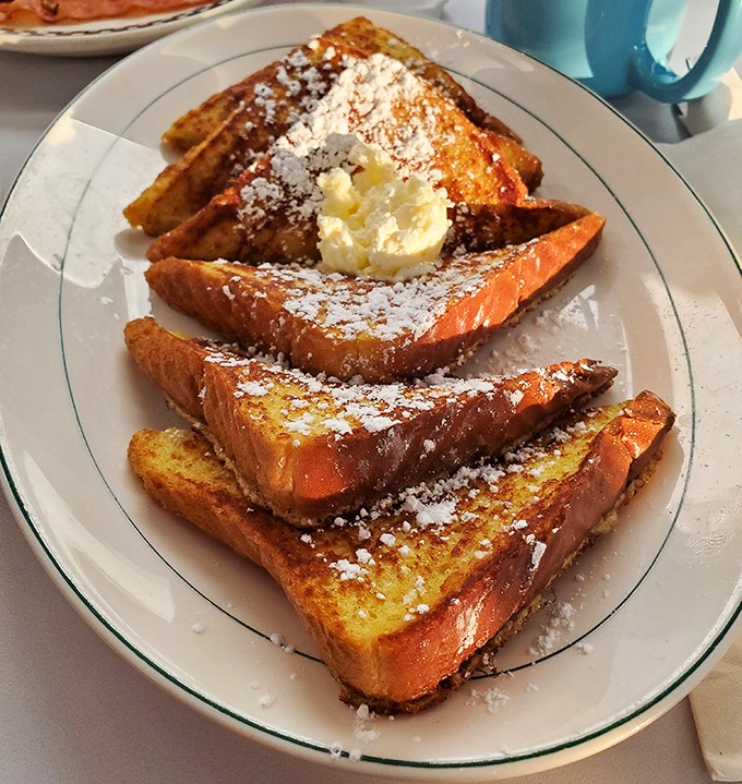 French toast that's achieved celebrity status in Cleveland. Those thick-cut slices with powdered sugar and butter could make even your cardiologist consider an exception.
