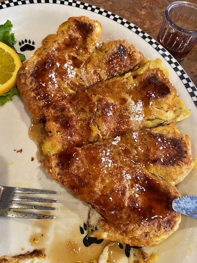Golden-brown perfection that makes other French toast hang its head in shame. That syrup pool? Pure breakfast nirvana.