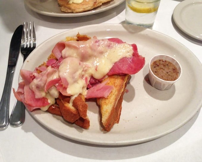 This isn't just ham and cheese&mdash;it's a morning masterpiece. The melty cheese blanket turns ordinary toast into a comfort food symphony.