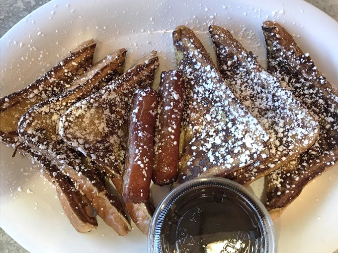 The legendary French toast that launched a thousand road trips. Dusted with powdered sugar like a winter wonderland for your taste buds.