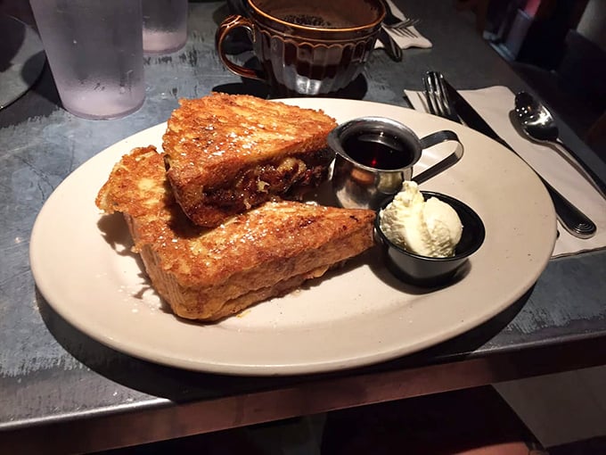 Goldy's French toast transforms ordinary bread into golden-brown slices of heaven, served with real maple syrup and whipped butter.