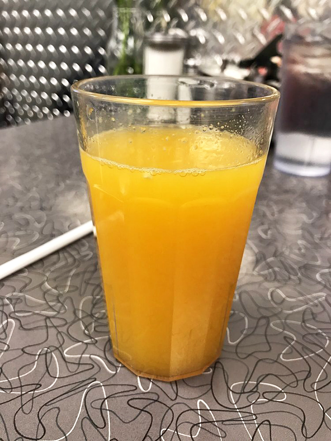 Liquid sunshine in a glass! This fresh-squeezed orange juice might make you forget coffee exists, at least until your second cup arrives.