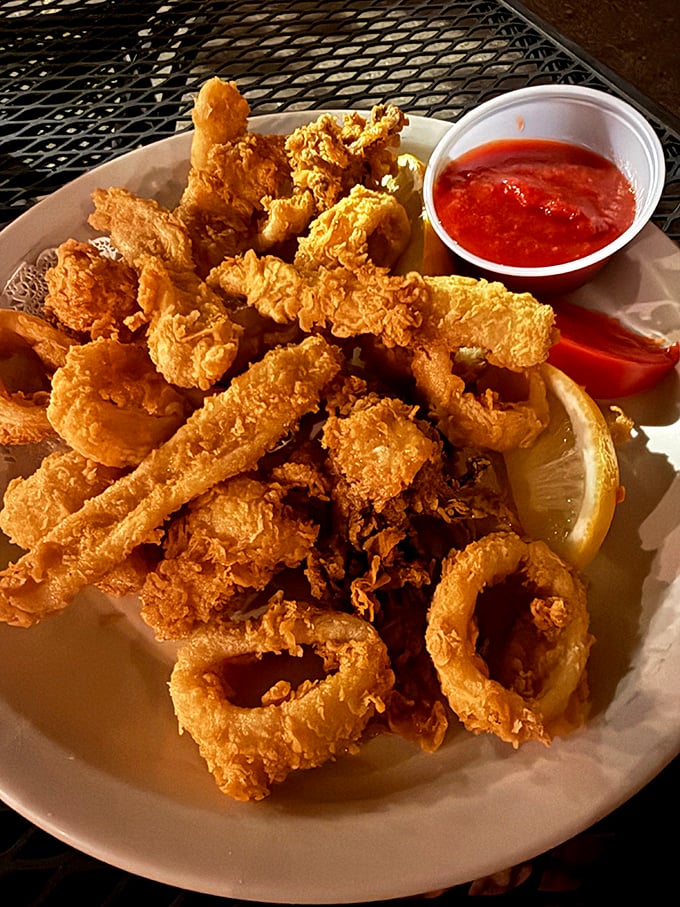 Golden, crispy calamari that would make Neptune himself swim to shore. This plate is the reason elastic waistbands were invented.