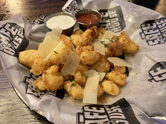 These aren't just cheese curds&mdash;they're edible intelligence assets. Golden-crisp outside, molten Wisconsin white cheddar inside, with dipping sauces for your debriefing pleasure.