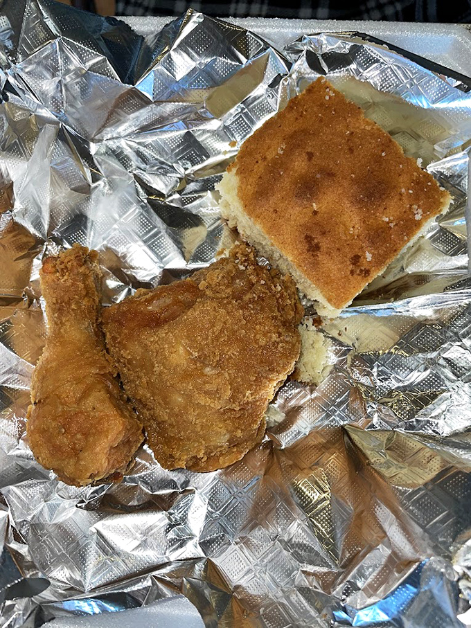 This isn't just fried chicken; it's edible poetry with a crispy golden crust. The cornbread sidekick isn't playing second fiddle&mdash;it's part of the headlining act.
