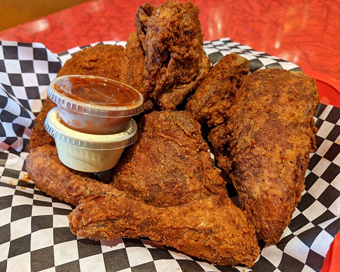 Golden-brown perfection that makes you want to high-five strangers. This fried chicken's crackling exterior guards juicy meat that's been kissed by smoke.