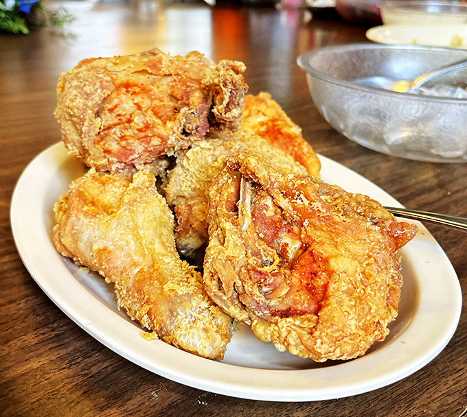 Golden-brown perfection that makes you question every other fried chicken you've ever eaten. The crust shatters, the meat stays juicy&mdash;this is chicken nirvana.