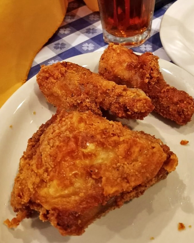 Golden-brown fried chicken that makes Colonel Sanders look like an amateur. This crispy masterpiece has launched a thousand road trips across Iowa.