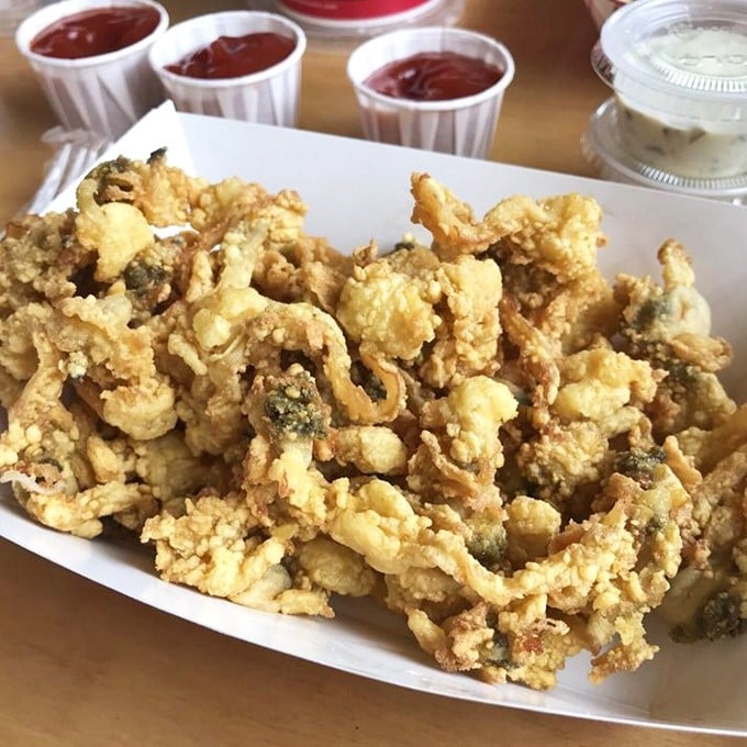 Golden treasure from the deep! These whole-belly clams aren't just fried&mdash;they're transformed into crispy, briny bites of New England bliss.