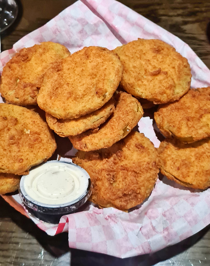 Golden-fried perfection that makes you wonder why anyone would eat a tomato any other way. Crispy outside, tangy inside – Southern ingenuity at its finest.