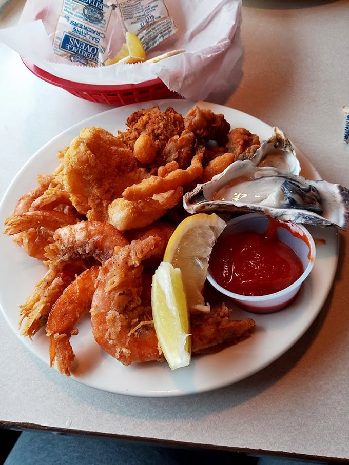 Golden-fried shrimp and oysters share plate space with cocktail sauce &ndash; proof that landlocked doesn't mean flavor-deprived.