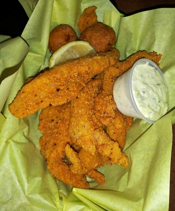 Golden-fried catfish that shatters with each bite, served with a side of tartar sauce that doesn't come from a packet. This is Texas aquatic cuisine at its finest.