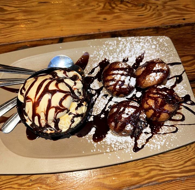 Behold the grand finale: deep-fried Oreos with vanilla ice cream and chocolate drizzle &ndash; proof that barbecue joints understand dessert better than fancy patisseries.