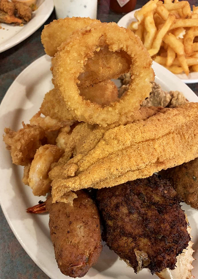 Golden-fried perfection that makes you want to high-five the chef. This platter isn't just food&mdash;it's edible Louisiana sunshine.