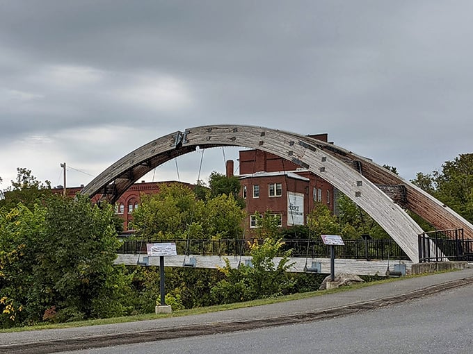 The Gateway Crossing Bridge arches gracefully over Houlton's waterway. Like a wooden rainbow promising not gold, but something more valuable&mdash;tranquility.