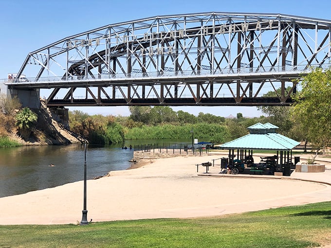 The Colorado River meets desert relaxation at Gateway Park. This steel bridge has witnessed generations of Yuma residents seeking respite from the legendary Arizona heat.