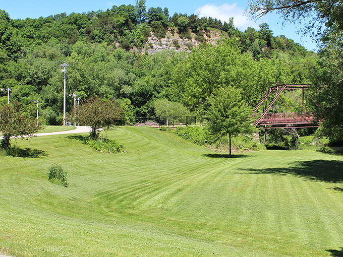 Modern playground equipment meets century-old trees in a partnership that makes everyone from toddlers to grandparents happy.
