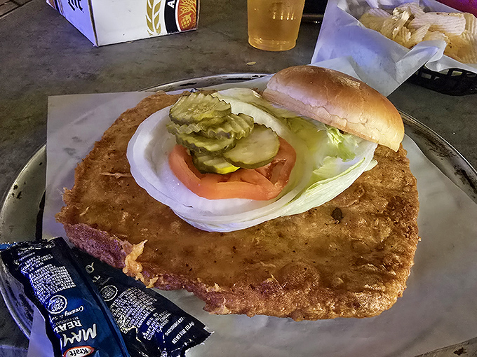 Behold the legendary King Tenderloin &ndash; where the bun serves merely as a suggestion and the breaded pork requires its own area code.