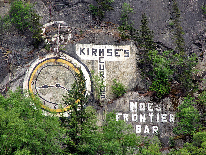 Kirmse's Curios advertisement, painted directly on the mountainside, might be the world's most dramatic billboard&mdash;take that, Times Square!