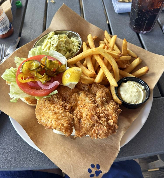 This golden-fried grouper sandwich isn't just lunch &ndash; it's Florida sunshine on a bun with all the fixings to make your taste buds dance.