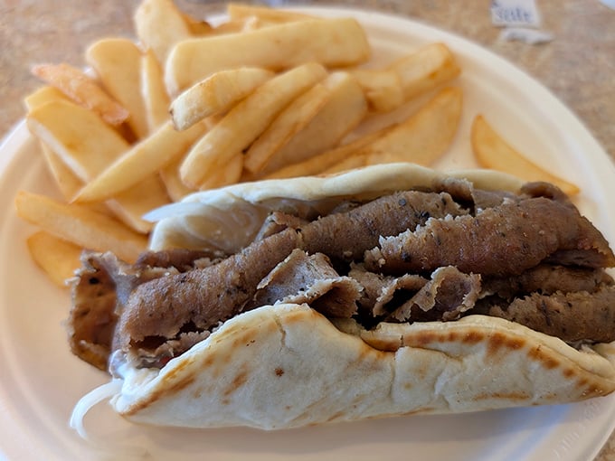 This isn't just a gyro&mdash;it's a masterclass in balance, with seasoned meat and fluffy pita creating perfect harmony.