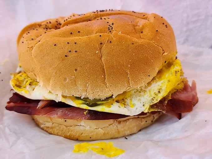 Breakfast nirvana: ham and eggs nestled in a poppy seed bun. The kind of sandwich that makes you question why you'd ever eat anything else.