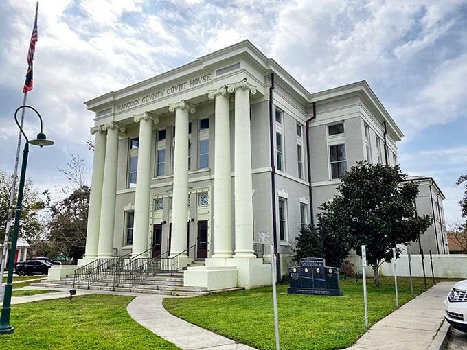 The Hancock County Court House stands as a gleaming testament to Southern architecture. Justice never looked so classically handsome.