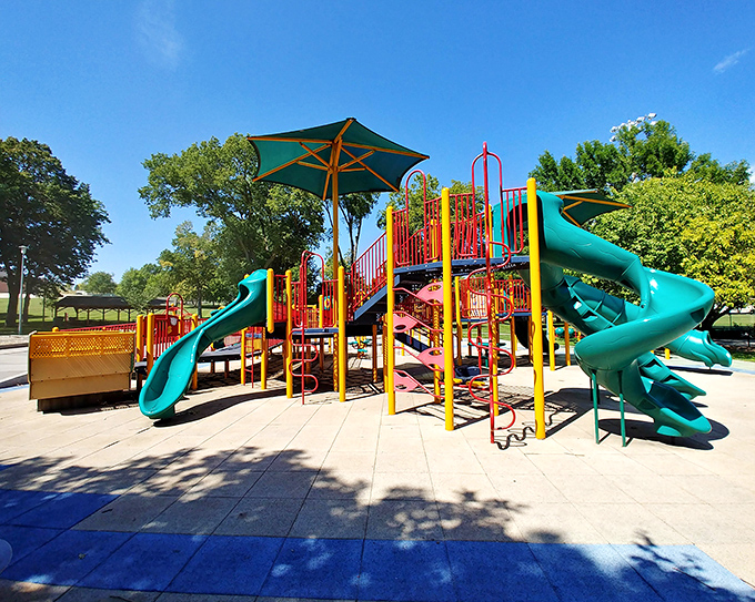 Modern playground equipment meets endless blue skies at this family-friendly park where kids burn energy and parents finally relax.