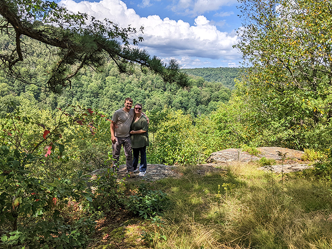 Nature's observation deck. These hikers found the perfect spot to take in Pennsylvania's endless green tapestry – no Instagram filter required.