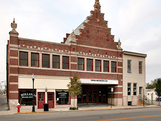 The Holland Theatre's Dutch-inspired facade proves that small-town entertainment venues once had more personality than a thousand multiplexes combined.