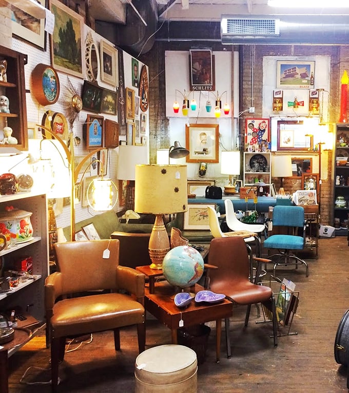 Mid-century modern paradise where every lamp, chair, and globe seems plucked from the set of Mad Men. Don Draper would approve of that leather armchair.