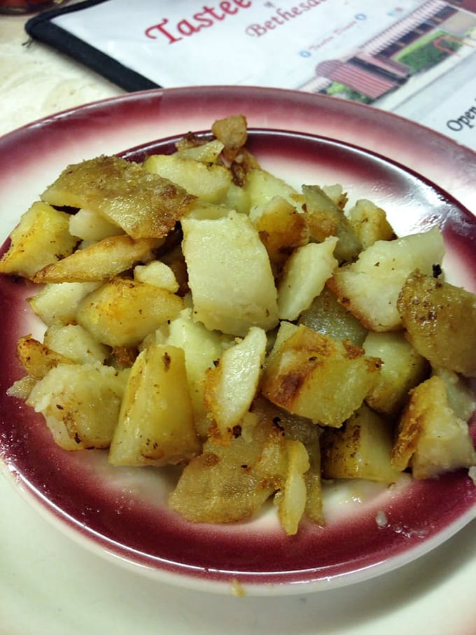 Home fries that could make a potato farmer weep with joy. Crispy edges, tender centers, and seasoned with what can only be described as magic.