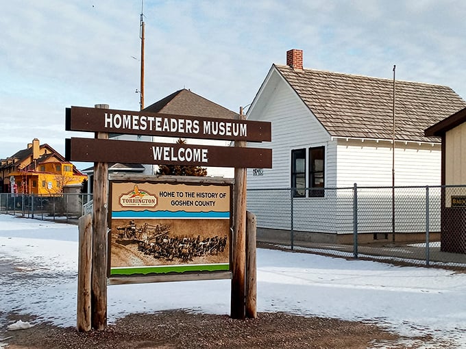 The Homesteaders Museum sign stands as a friendly gatekeeper to Goshen County's past, where pioneer stories await just beyond those doors.