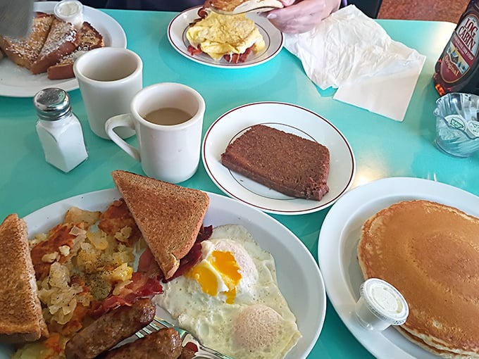 Breakfast nirvana on a plate &ndash; eggs, hash browns, toast, and breakfast meats arranged in perfect harmony. The breakfast gods are smiling.