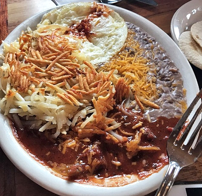 Huevos Rancheros that could settle border disputes&mdash;crispy tortillas swimming in savory sauces under a blanket of melted cheese and perfectly fried eggs.
