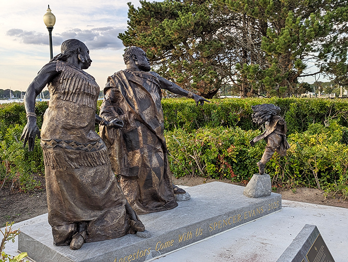 This poignant waterfront sculpture captures Bristol's indigenous heritage, with figures gazing eternally toward Narragansett Bay's shimmering waters.