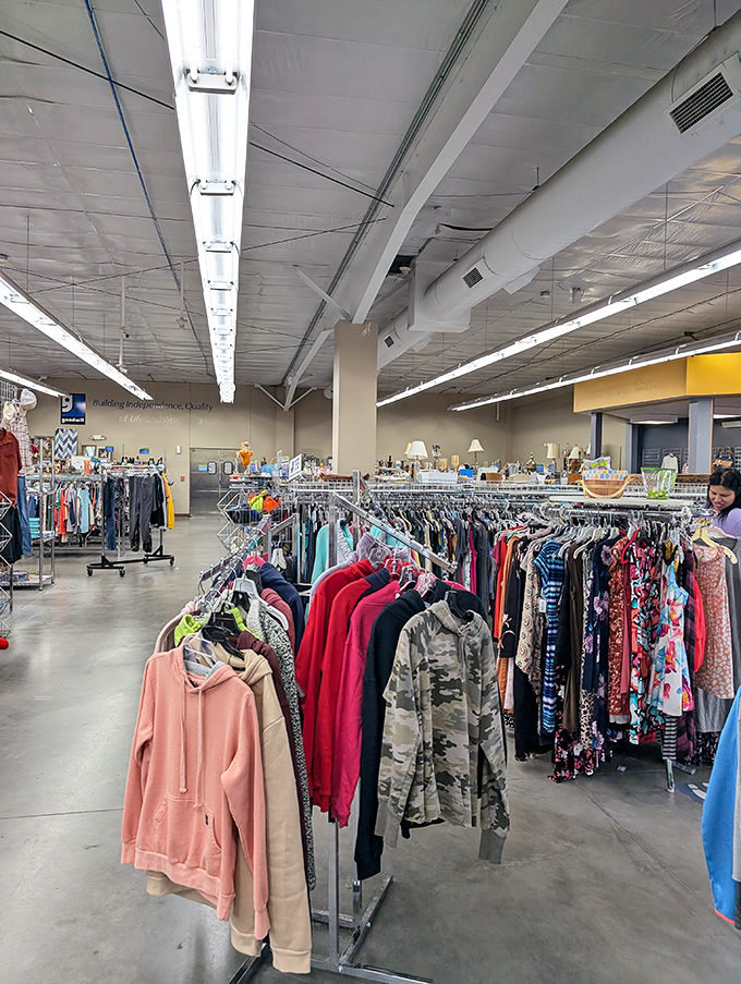 The clothing section offers a time-traveling fashion experience spanning decades. From vintage polyester to yesterday's designer labels, every rack tells a story.