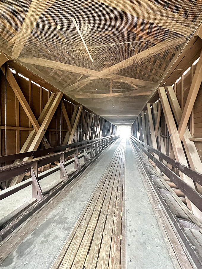 Inside, the bridge reveals its true character&mdash;a cathedral of wooden beams creating a tunnel of light that practically begs for contemplative strolls.