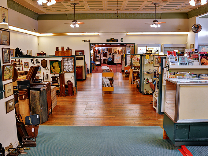 Wide aisles and warm wooden floors invite exploration without the claustrophobia of lesser antique stores. Your treasure-hunting path awaits!