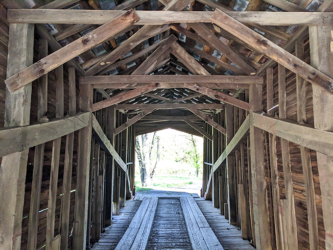 Looking up reveals the bridge's ingenious wooden skeleton&mdash;each beam and brace working in harmony for over a century.