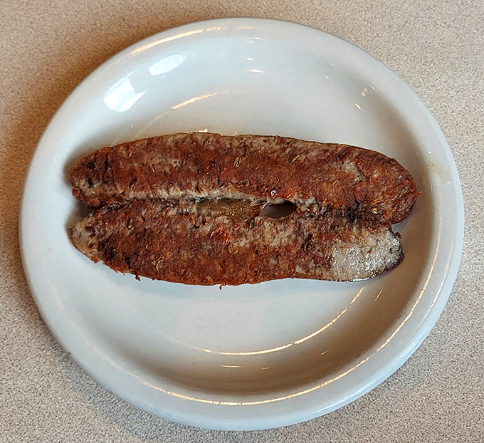 This Italian sausage isn't just cooked, it's been persuaded to reach its full delicious potential.