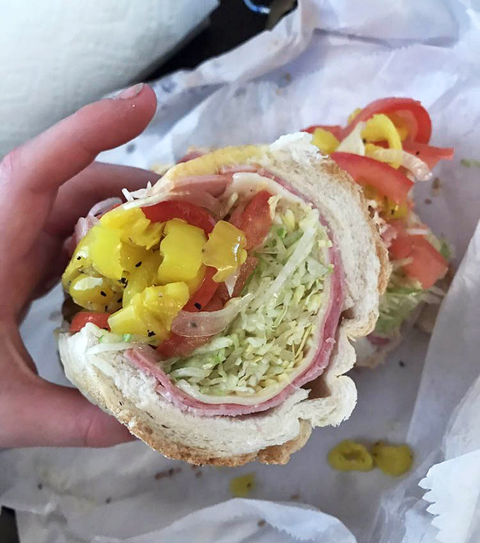 Behold the Italian hoagie in its natural habitat&mdash;wrapped in paper, bursting with meats and veggies. This is sandwich architecture at its finest.