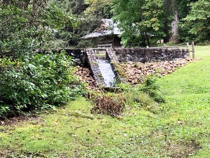 This historic stone dam whispers stories of early settlers while providing a picturesque backdrop for your obligatory "I went outside today" social media post.